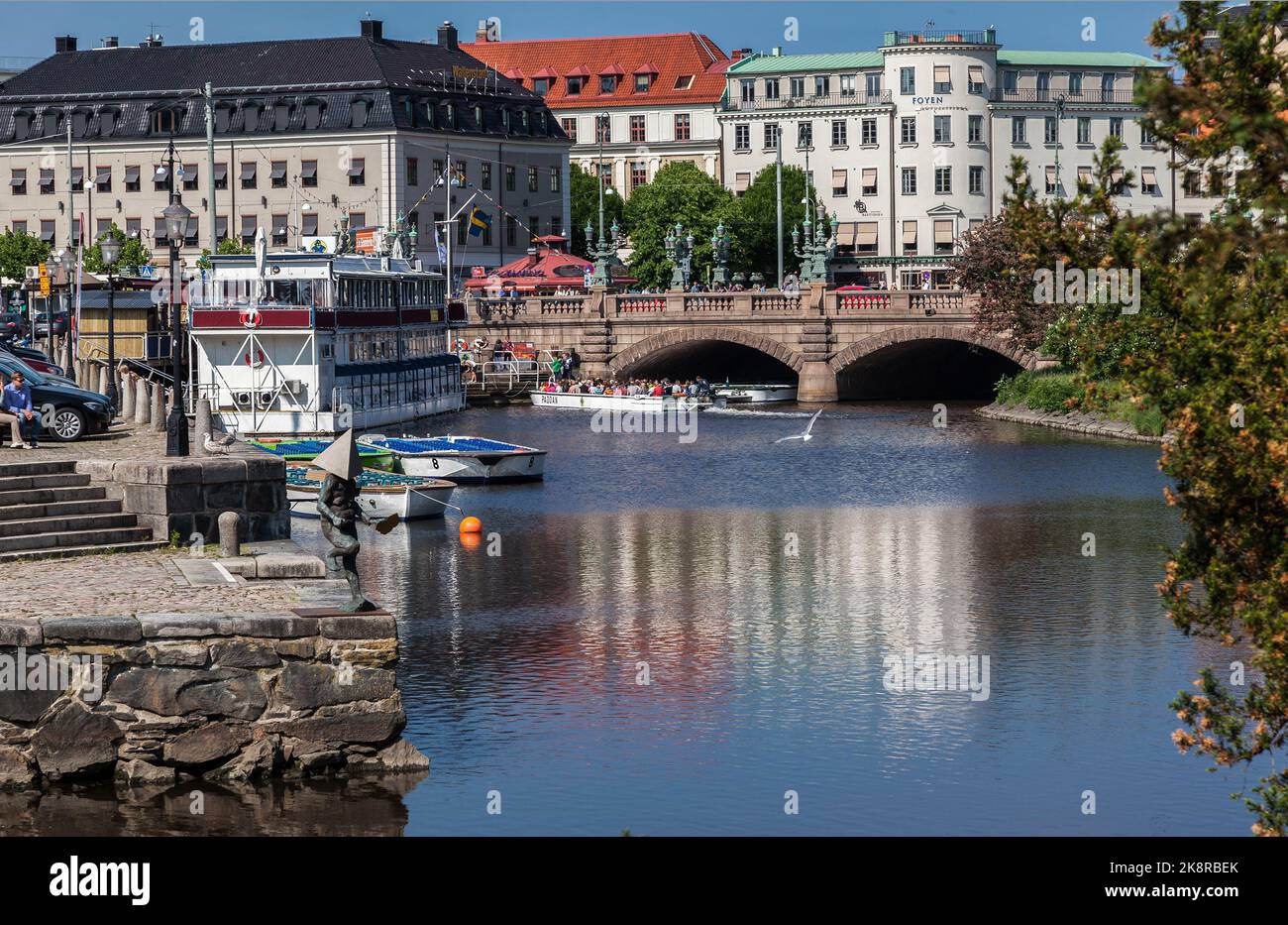 A scenic view of a bridge, canal and the historical buildings of ...