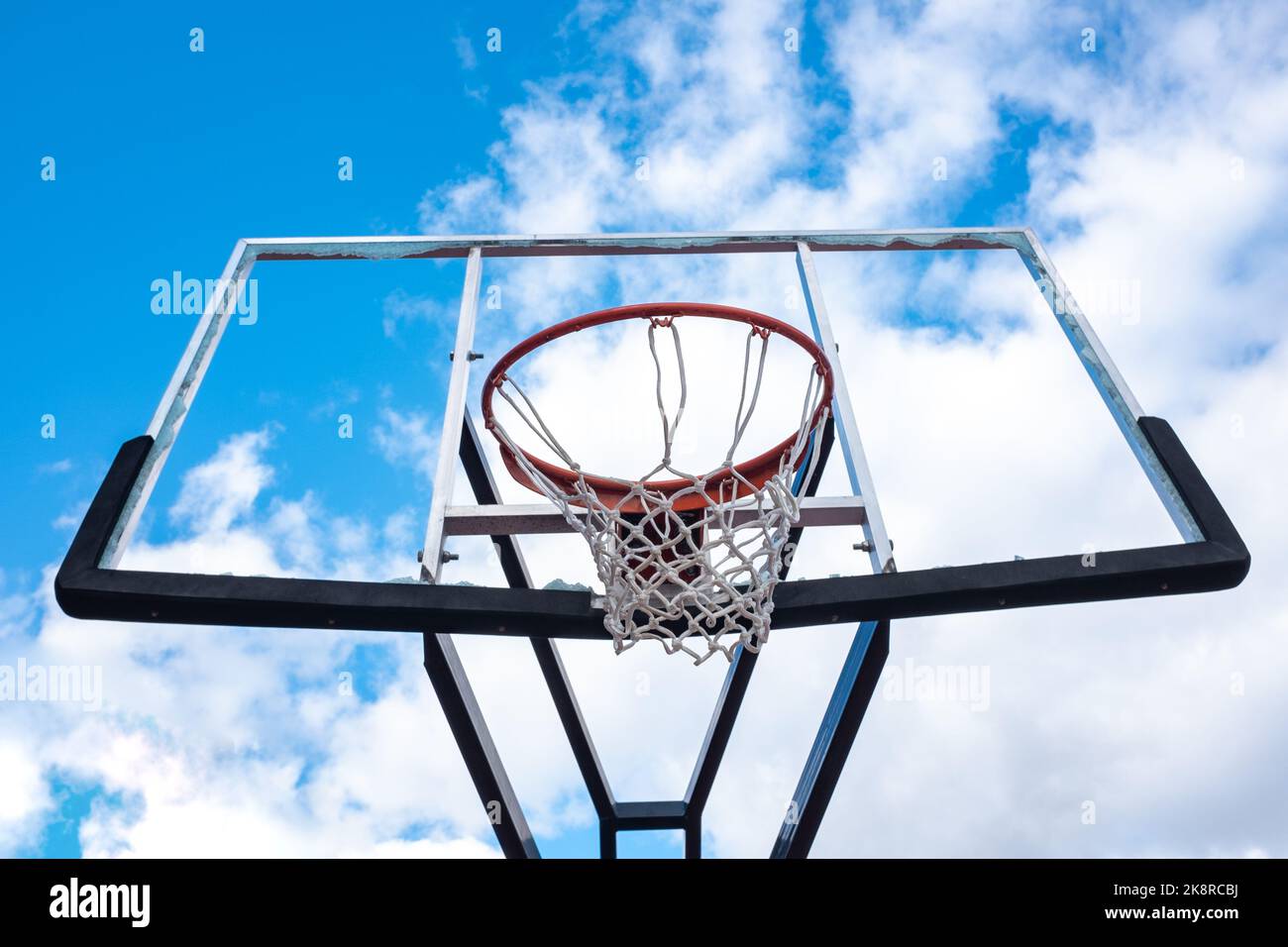 Broken glass backboard and broken hoop on the basketball court Stock ...