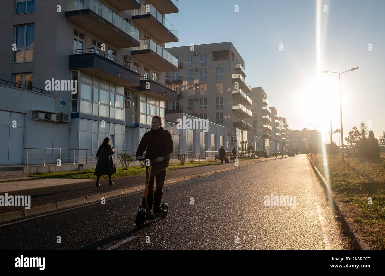 Male rides electric scooter hi-res stock photography and images - Alamy