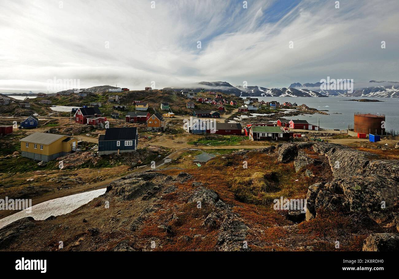 A beautiful view of rural houses on the shores of Kulusuk, Greenland ...