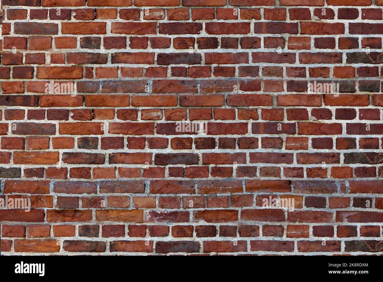 Old wall red briks tiled background, regular block texture. Wallpaper ...