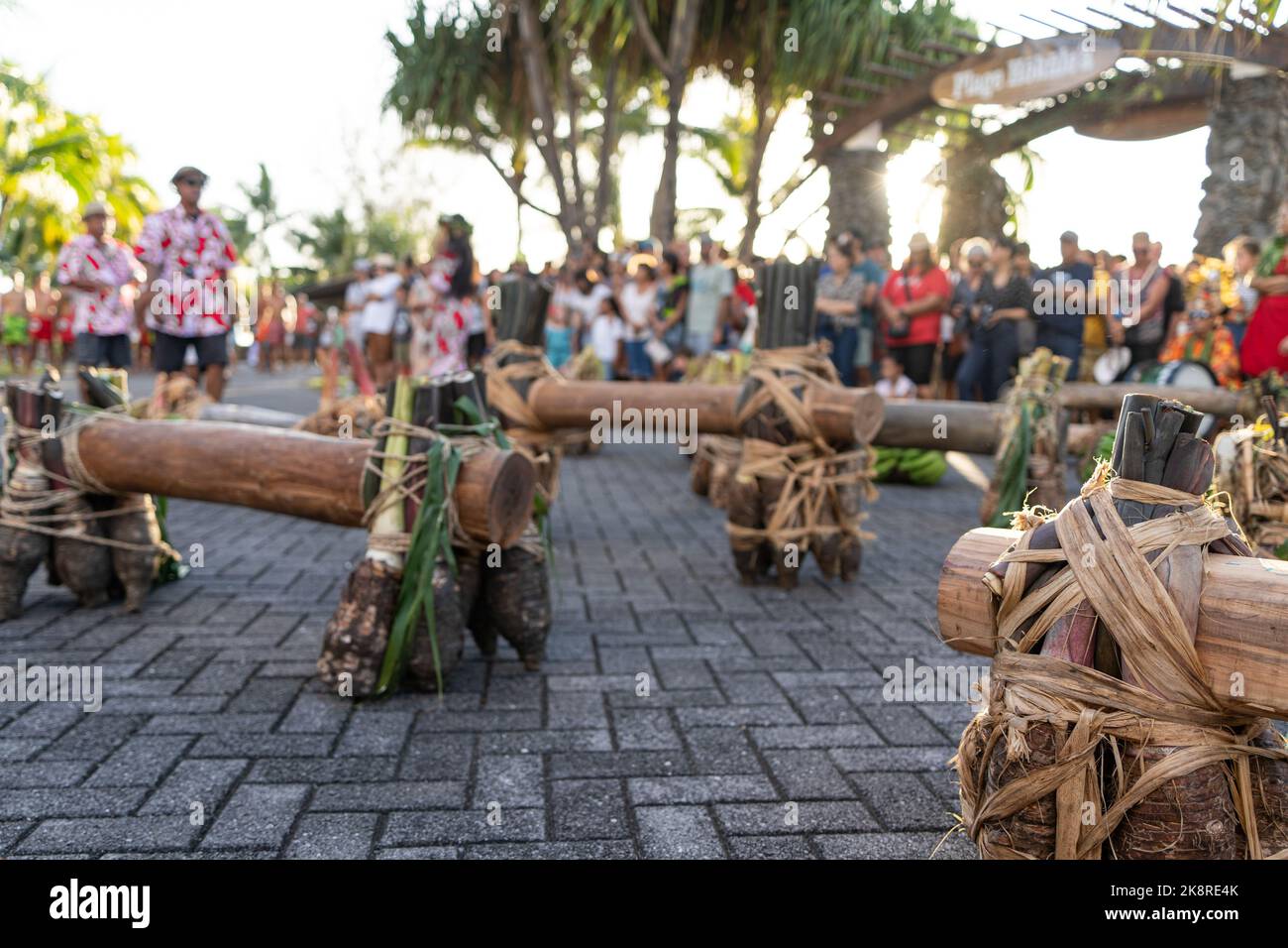 People wearing traditional clothes running with fruits during a ...
