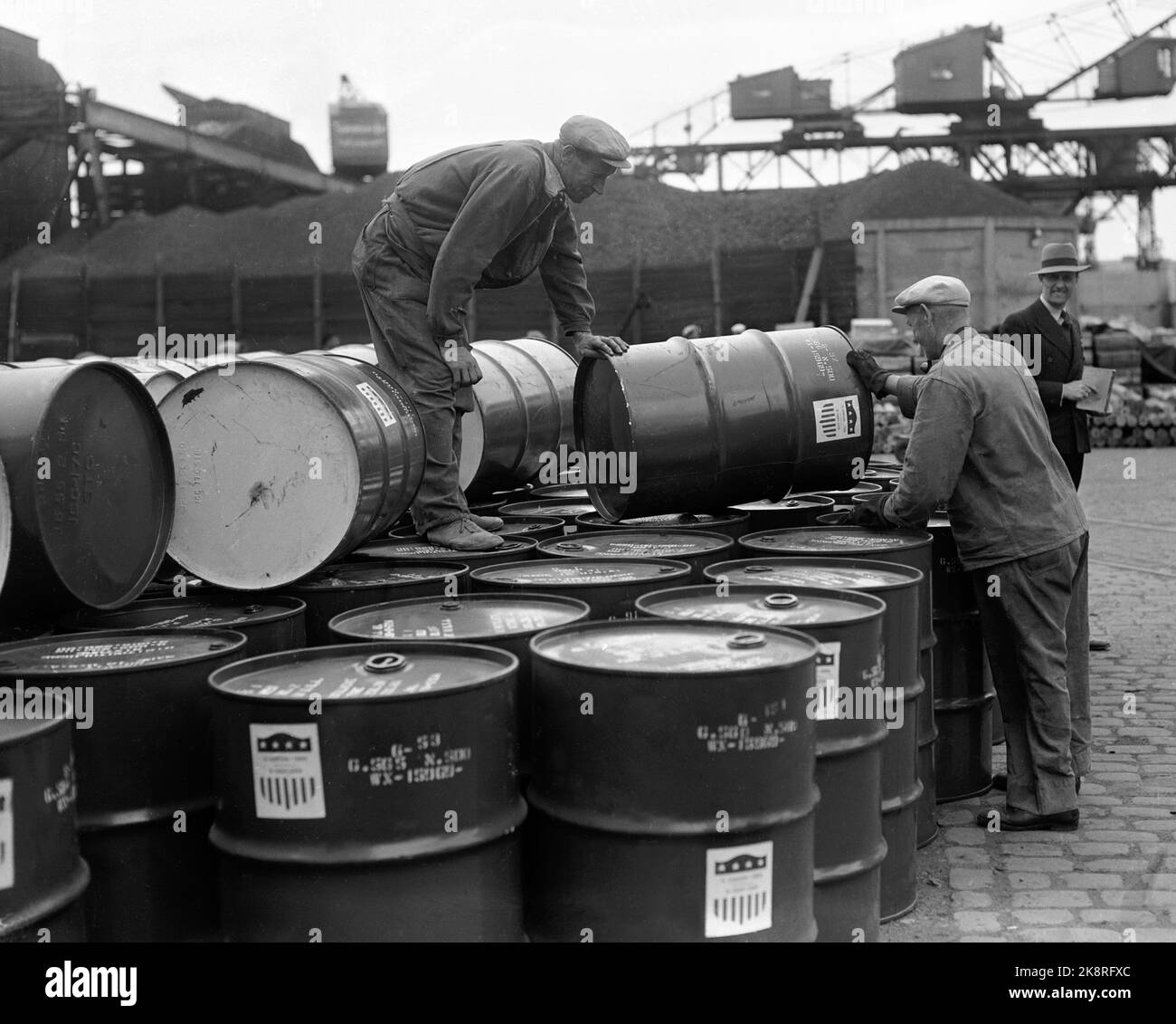 Ntb ntb logos port workers barrel loading unloading working relief hi ...