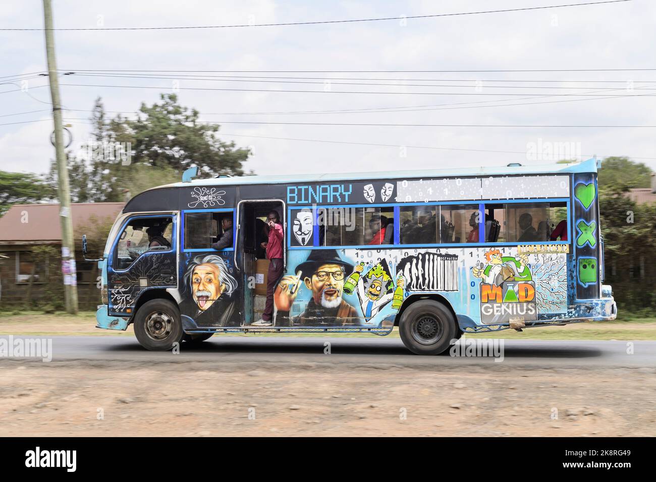 A bus with custom paintwork driving along Ngong road near the junction ...