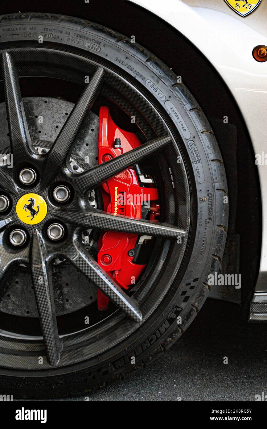 A vertical closeup shot of Ferrari 488 Pista Carboceramic breaks and ...