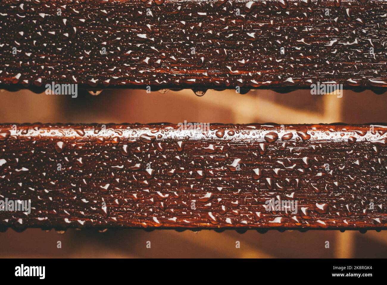 The water Drops On Wooden park bench Stock Photo - Alamy
