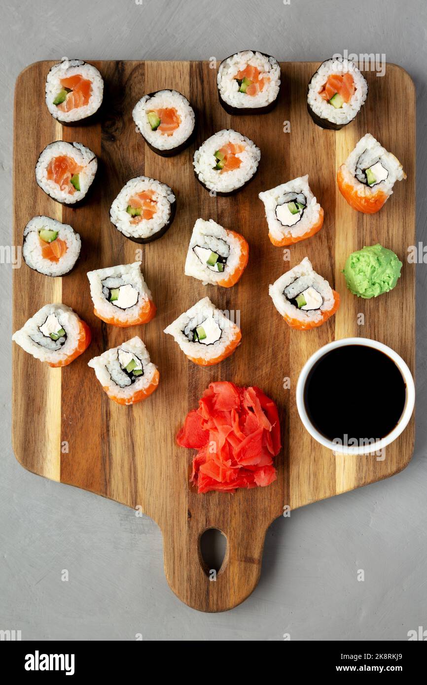Homemade Sushi Platter with Wasabi and Soy Sauce on a Board, top view ...