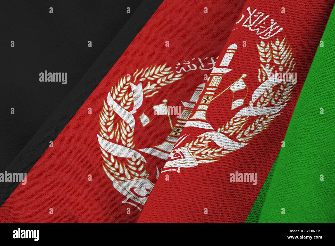 Afghanistan flag with big folds waving close up under the studio light ...