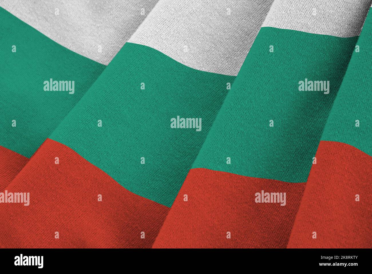 Bulgaria flag with big folds waving close up under the studio light ...