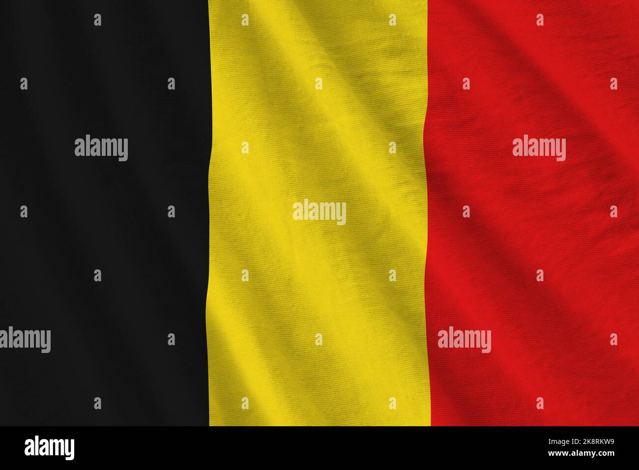Belgium flag with big folds waving close up under the studio light ...
