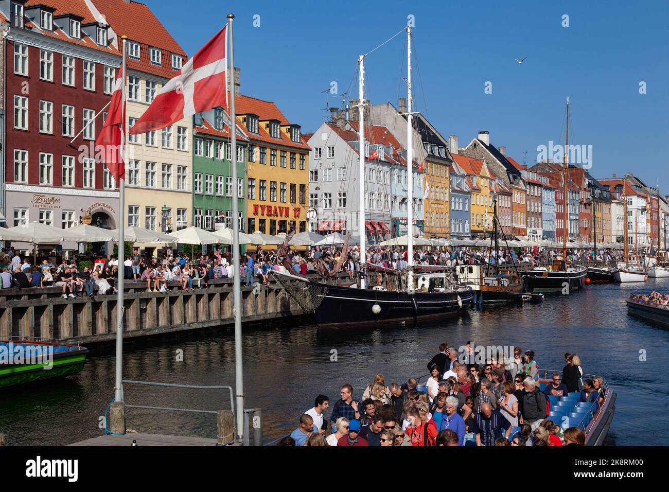 The Nyhavn 17th-century waterfront, canal, and entertainment district ...