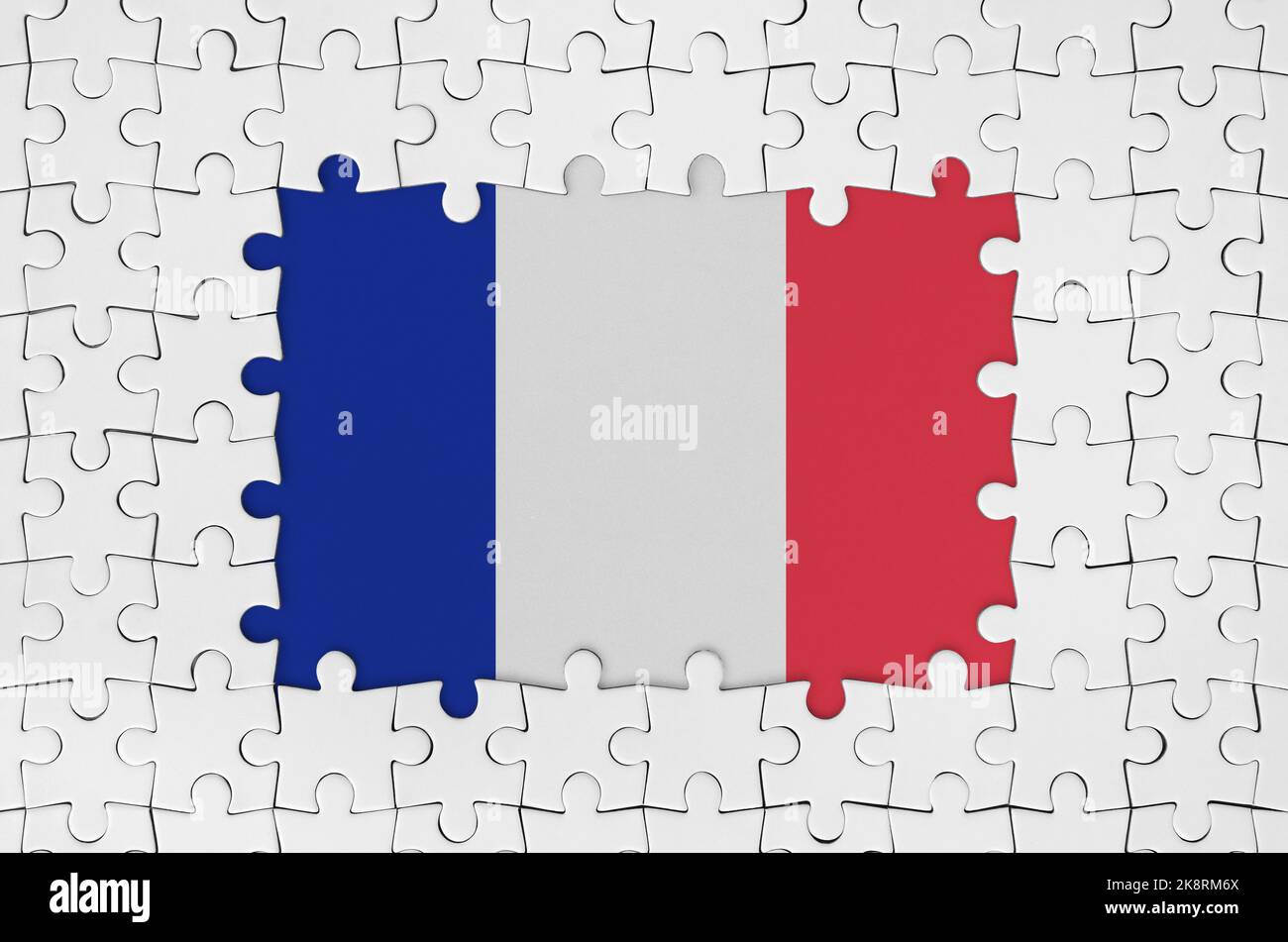 France flag in frame of white puzzle pieces with missing central parts ...