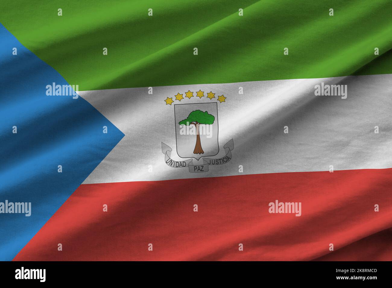 Equatorial Guinea flag with big folds waving close up under the studio ...