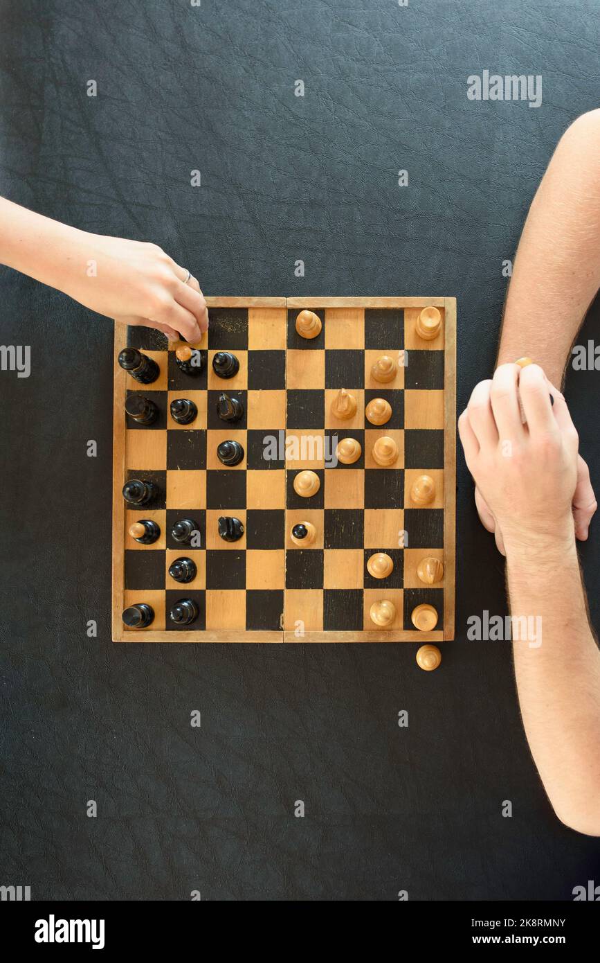 A top view of two players playing a game of chess Stock Photo - Alamy