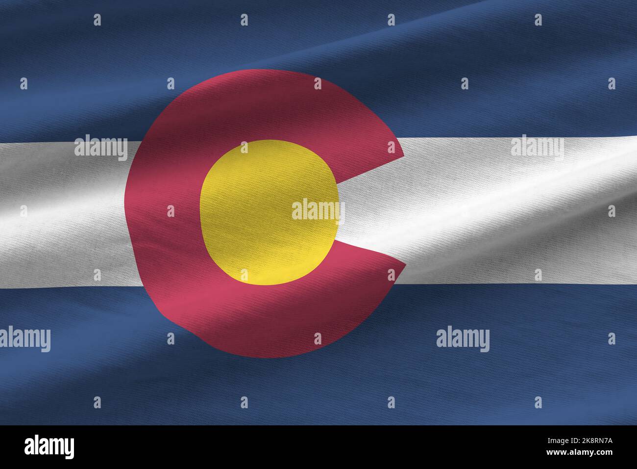Colorado US state flag with big folds waving close up under the studio ...