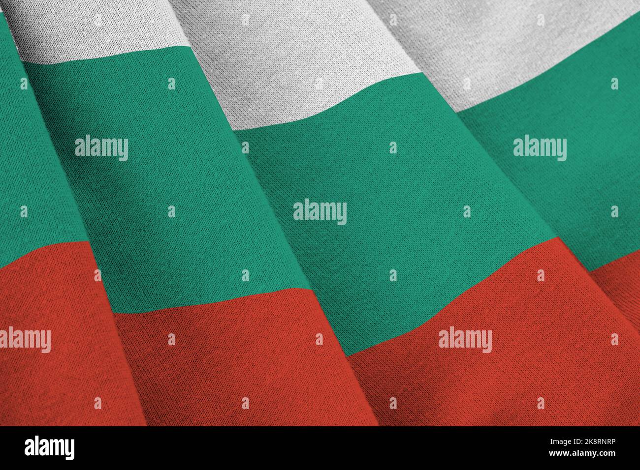 Bulgaria flag with big folds waving close up under the studio light ...