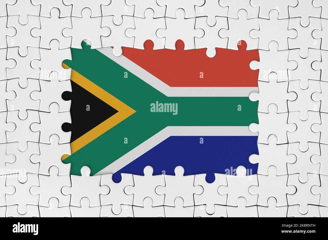 South Africa flag in frame of white puzzle pieces with missing central ...