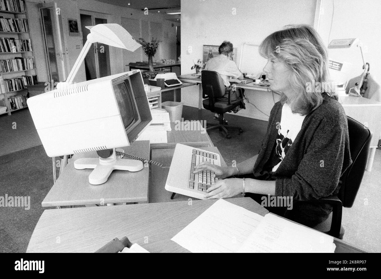 Oslo 1986-07: Working life - Woman in work in office, here at screen ...