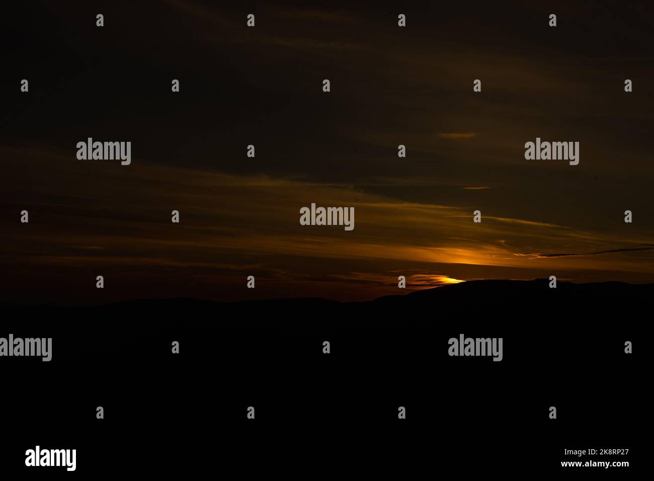 Sunset in mountains in summer landscape Stock Photo - Alamy