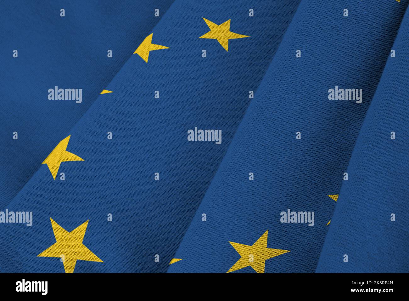 European union flag with big folds waving close up under the studio ...