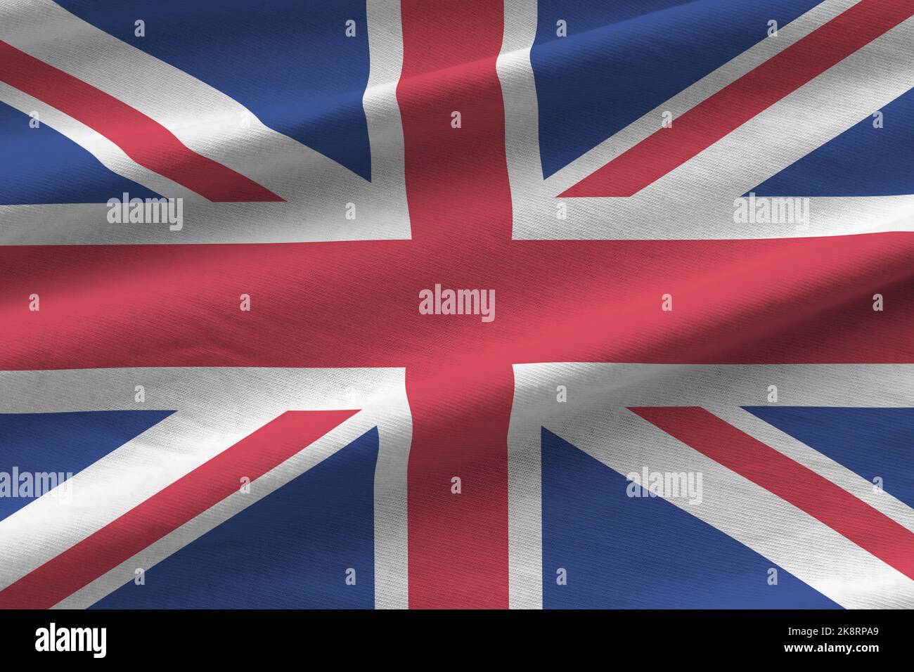 Great britain flag with big folds waving close up under the studio ...
