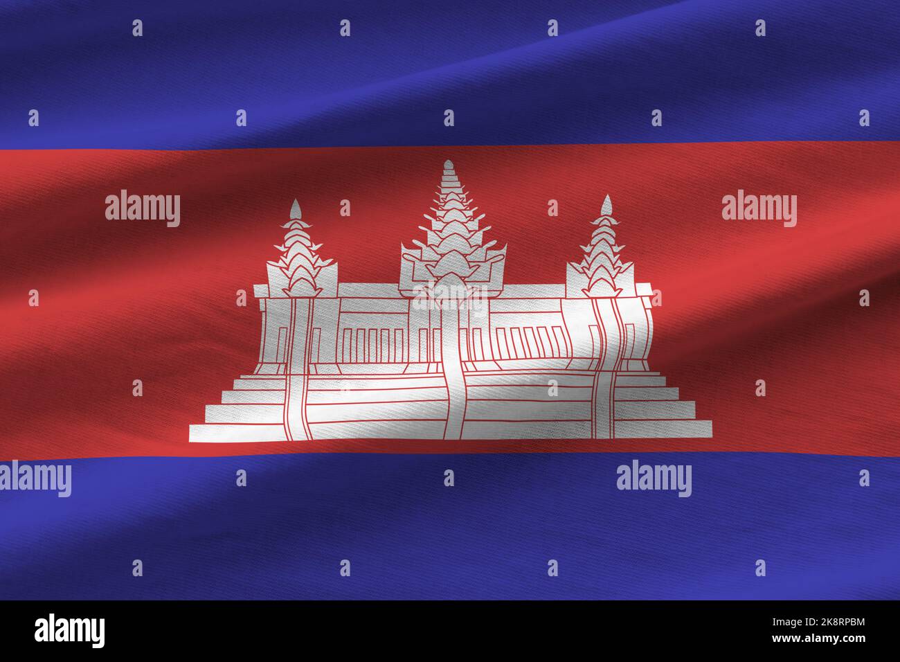 Cambodia flag with big folds waving close up under the studio light ...