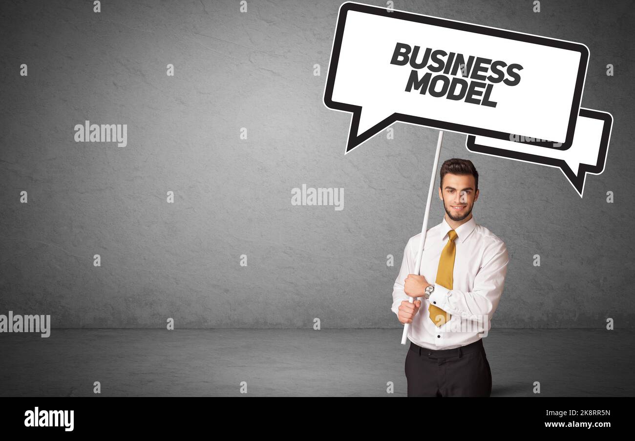 business person in casual holding road sign Stock Photo - Alamy