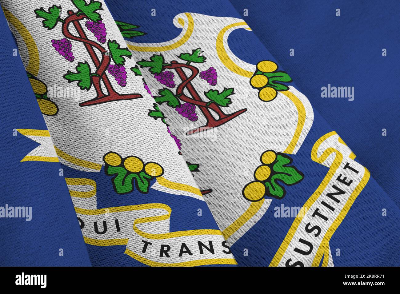 Connecticut US state flag with big folds waving close up under the ...