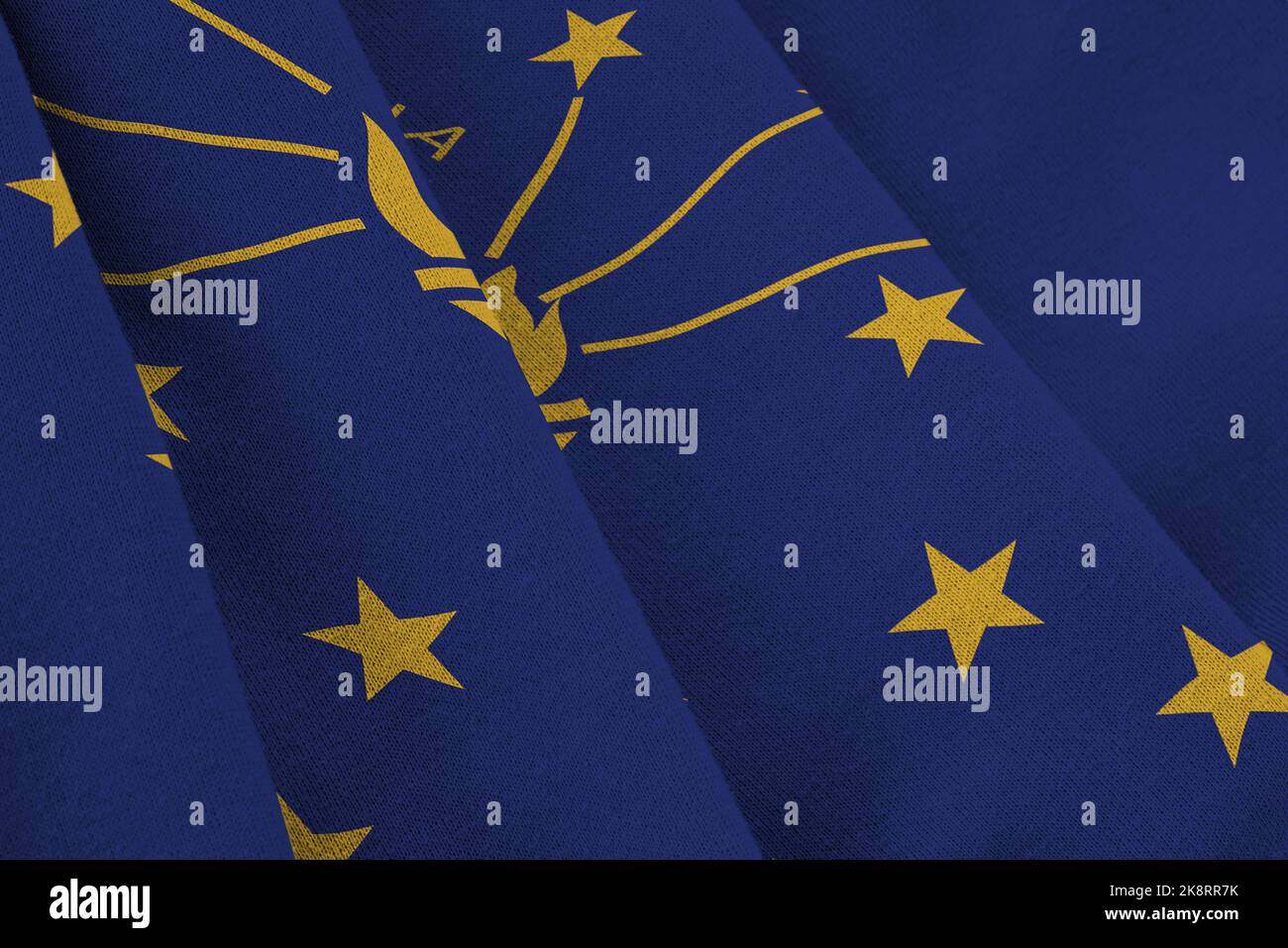 Indiana US state flag with big folds waving close up under the studio ...