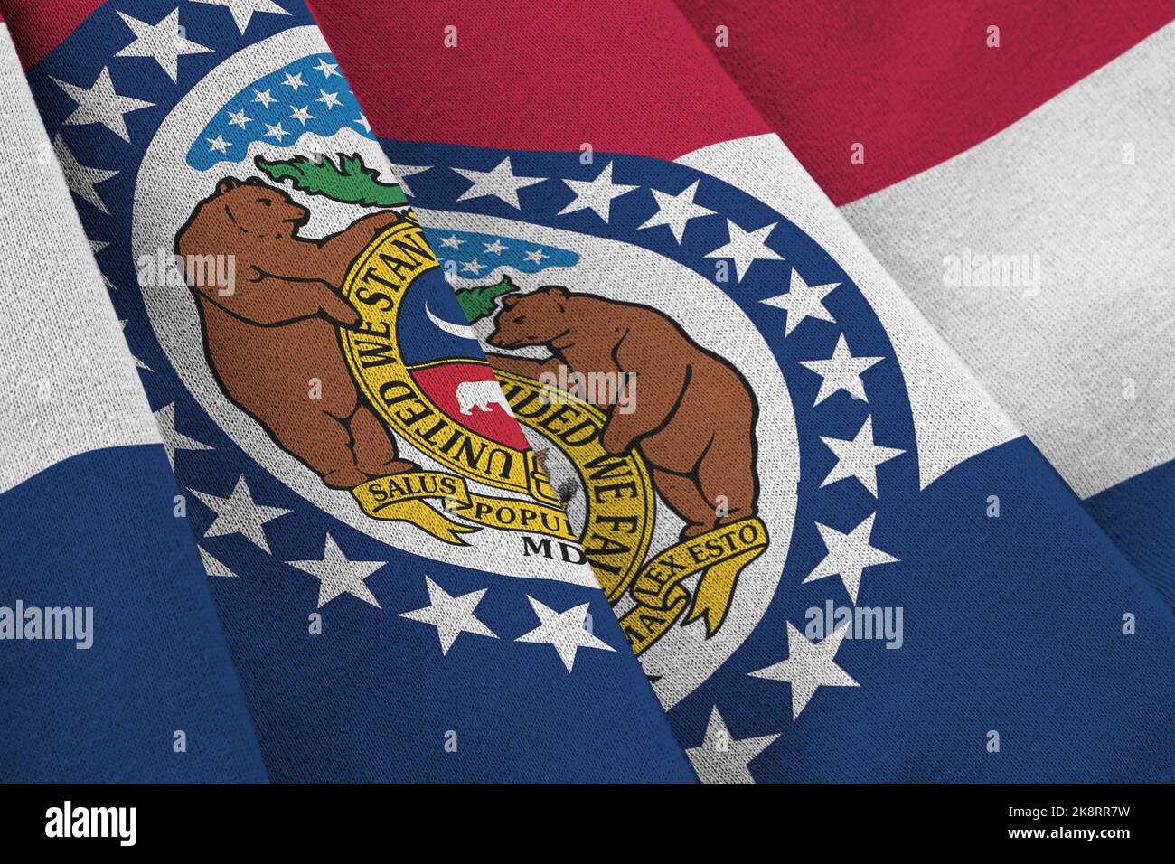 Missouri US state flag with big folds waving close up under the studio ...