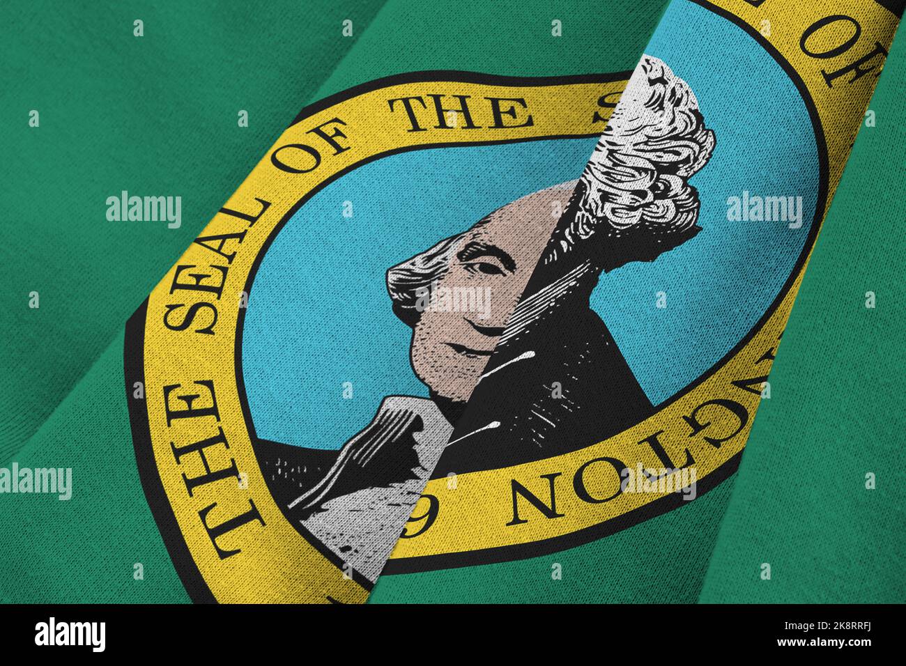 Washington US state flag with big folds waving close up under the ...