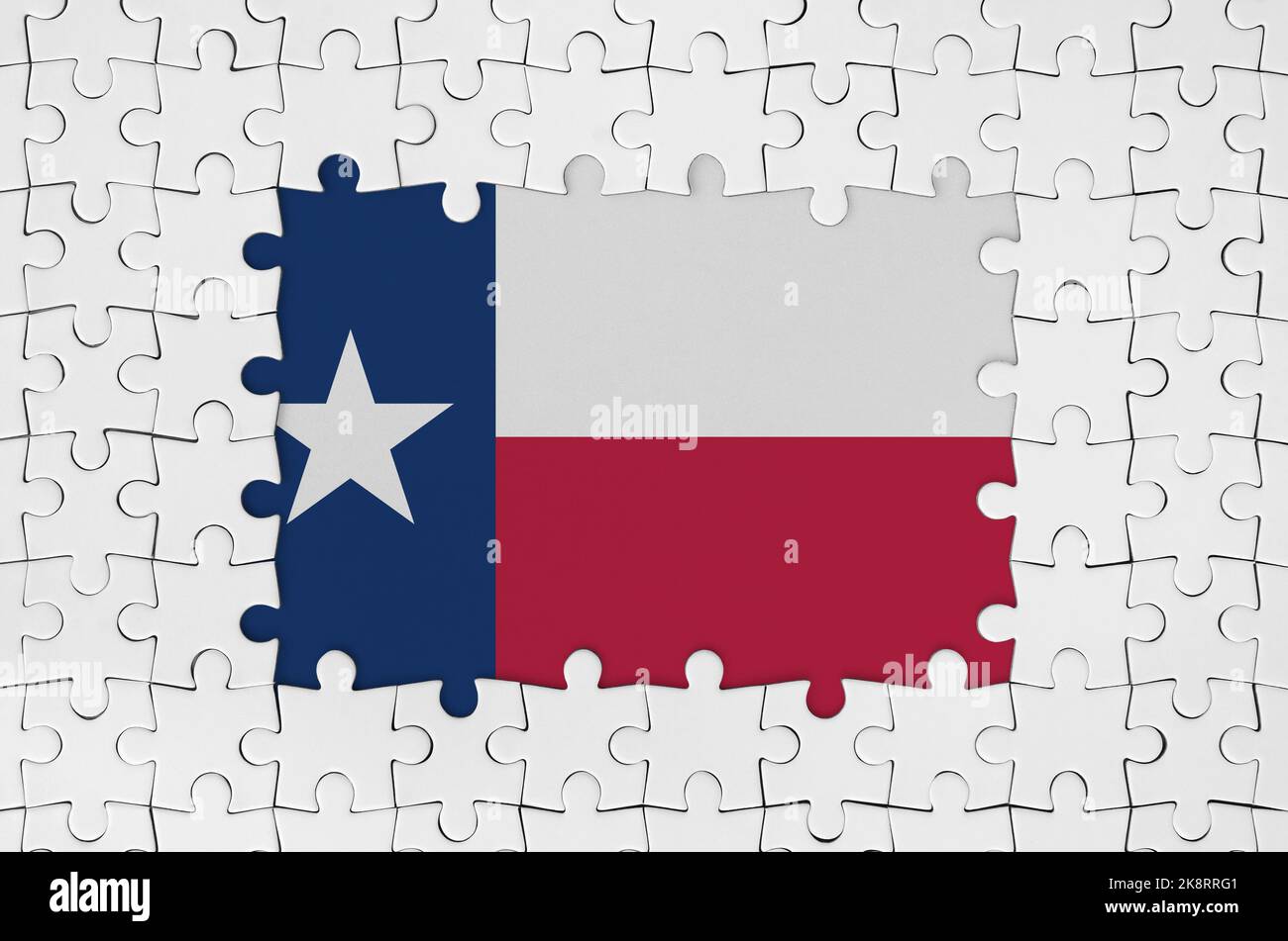 Texas US state flag in frame of white puzzle pieces with missing ...