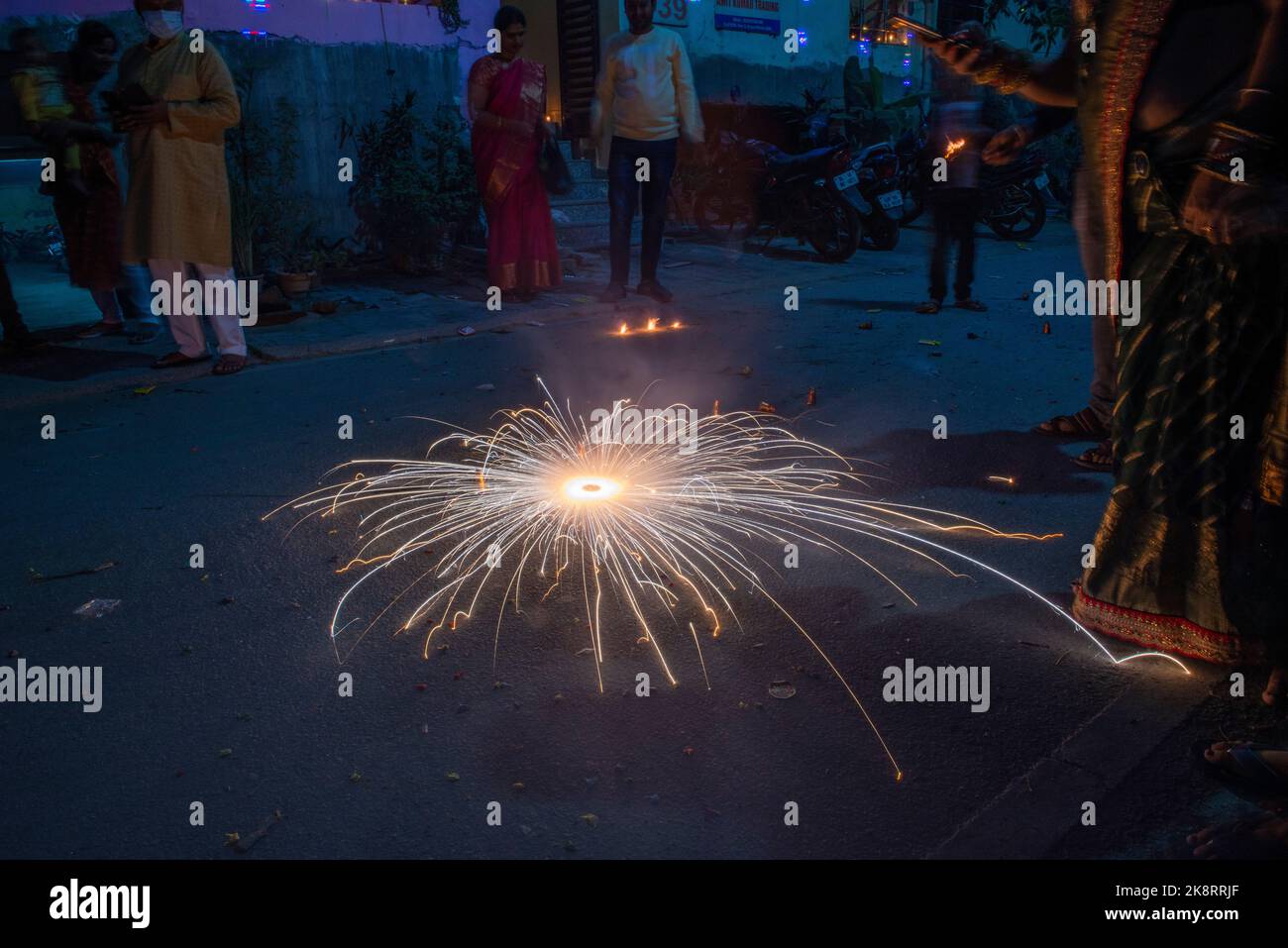 Ghaziabad, India. 24th Oct, 2022. People seen burning firecrackers on ...