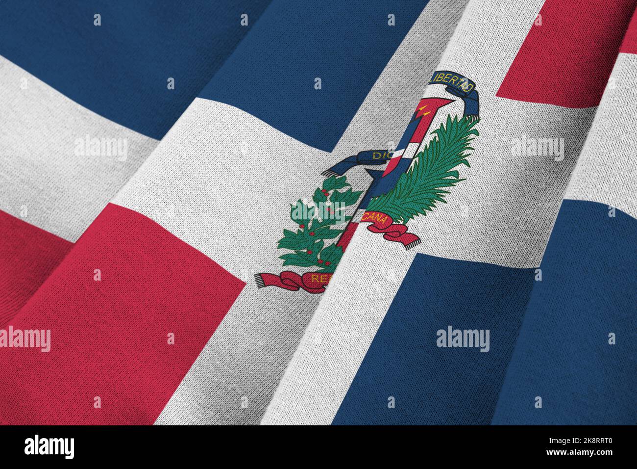 Dominican Republic flag with big folds waving close up under the studio ...