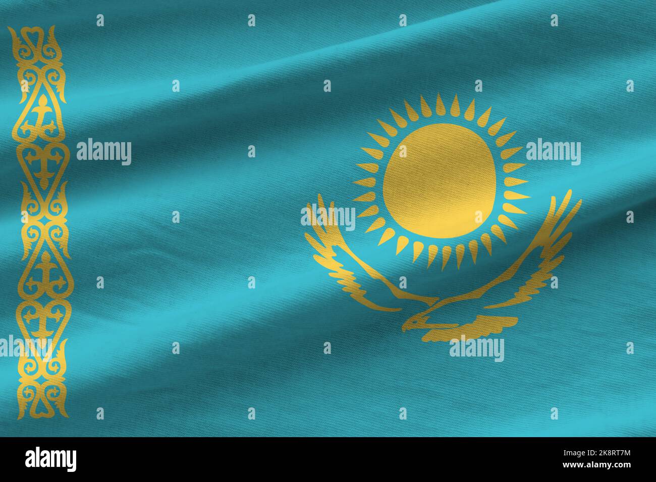 Kazakhstan flag with big folds waving close up under the studio light ...