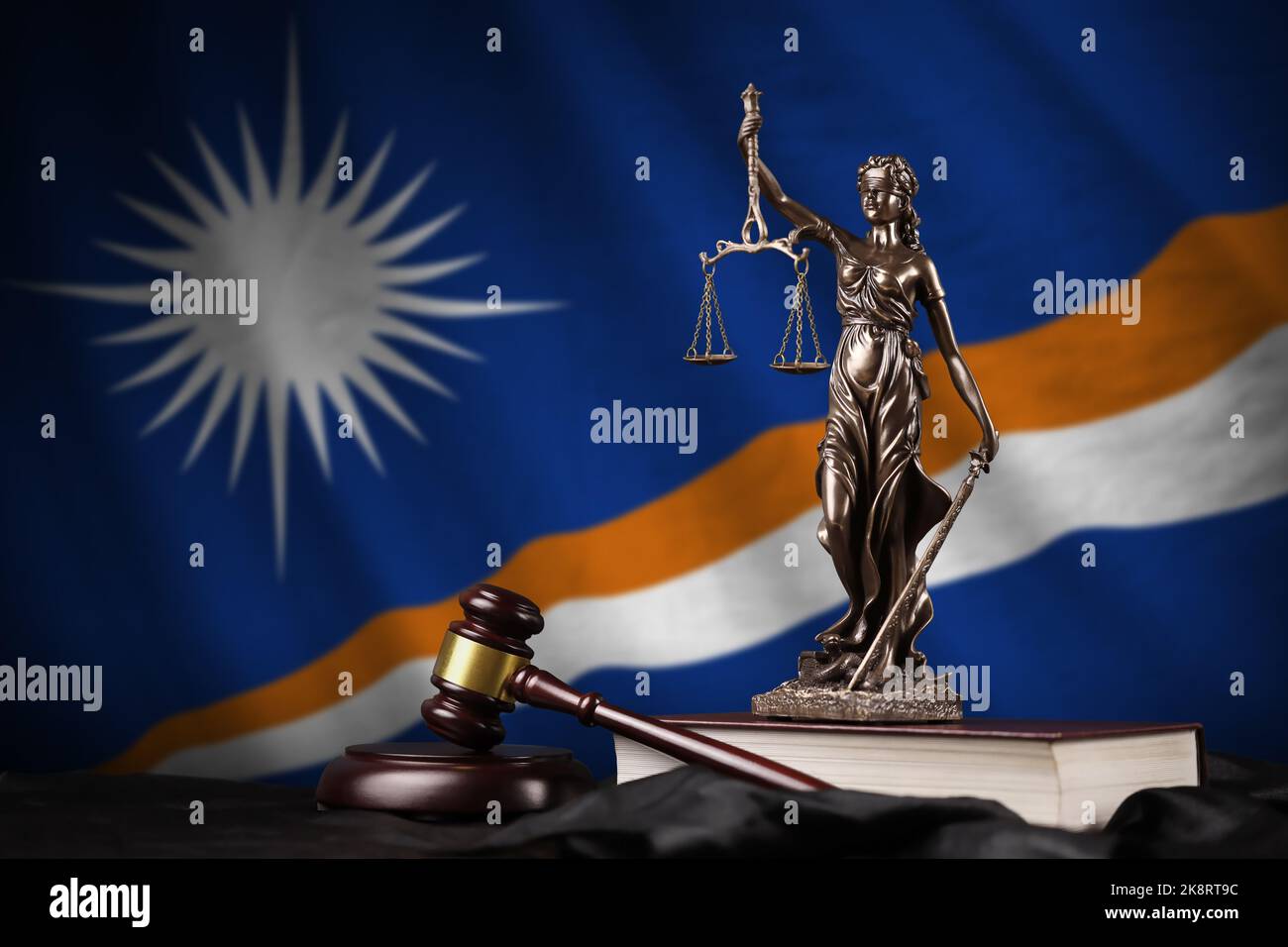 Marshall Islands flag with statue of lady justice, constitution and ...