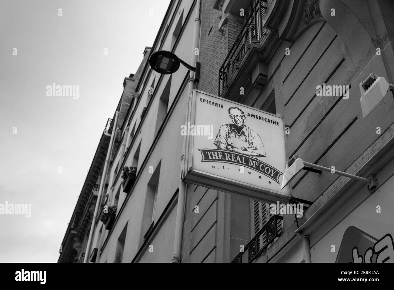 A grayscale of The Real Mc Coy cafe sign, Paris, France Stock Photo - Alamy