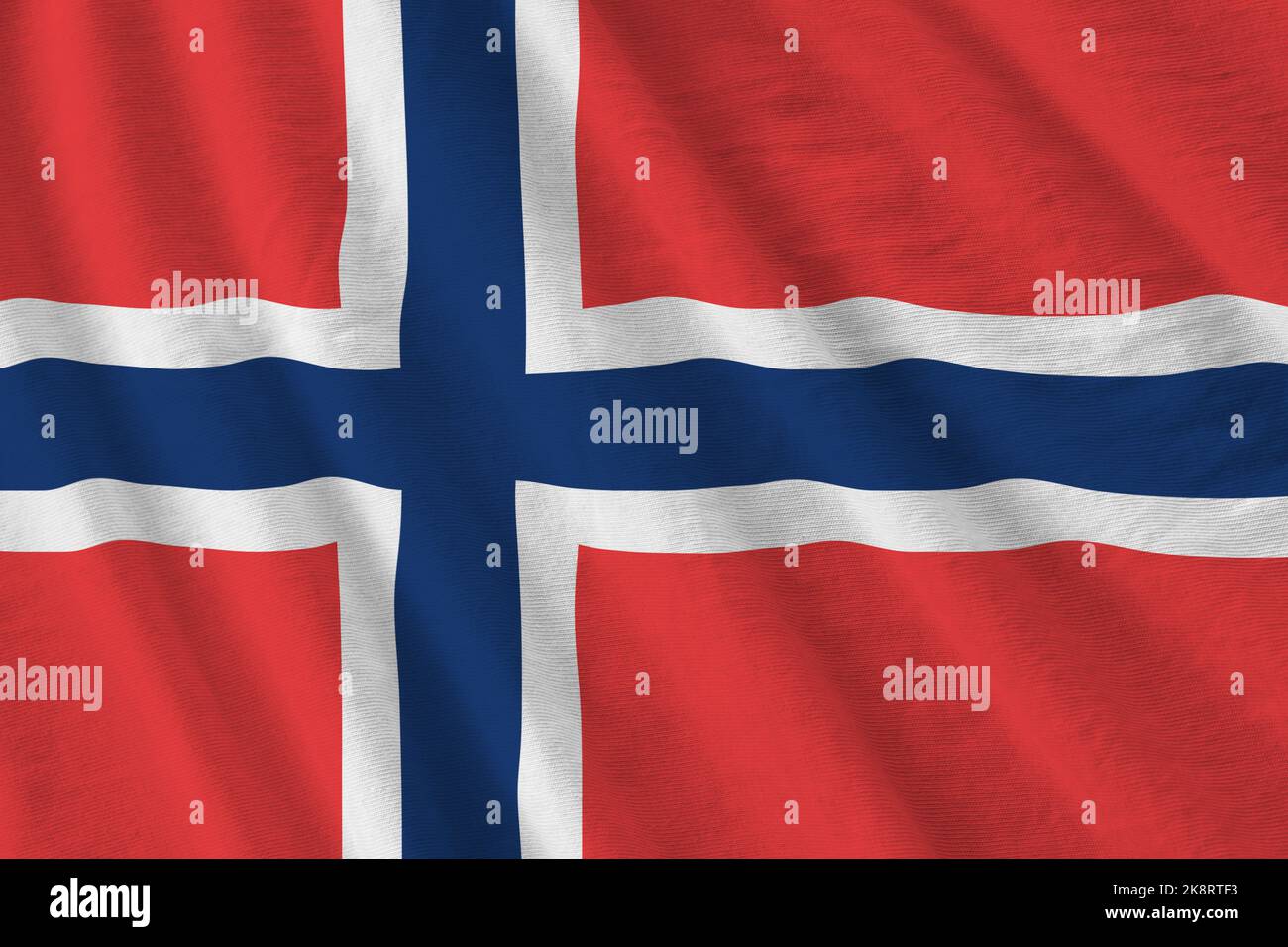 Norway flag with big folds waving close up under the studio light ...