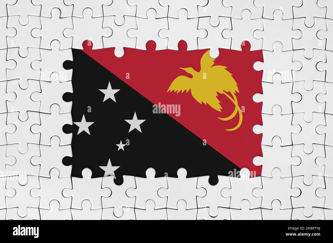 Papua New Guinea flag in frame of white puzzle pieces with missing ...