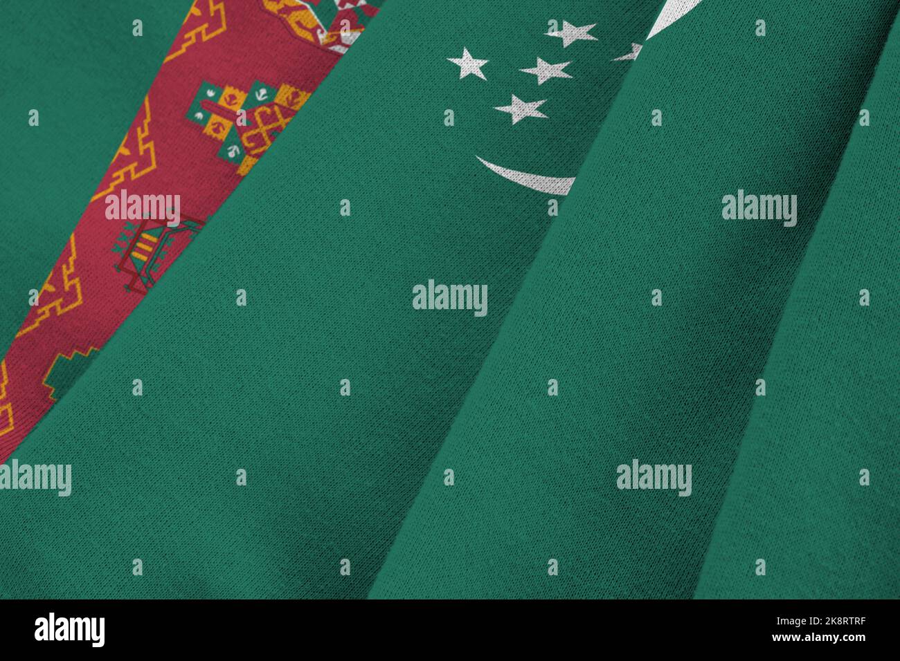 Turkmenistan flag with big folds waving close up under the studio light ...