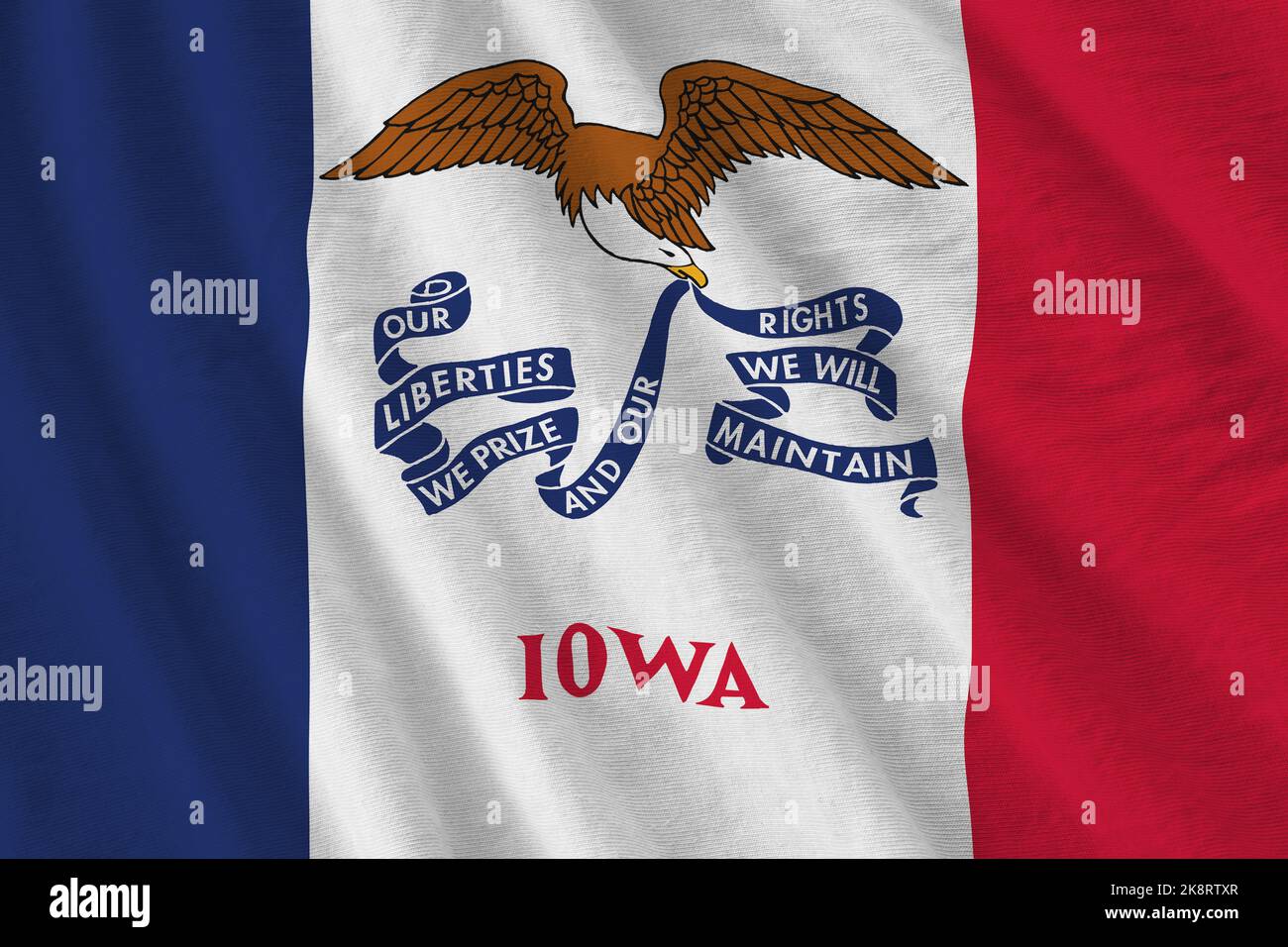Iowa US state flag with big folds waving close up under the studio ...