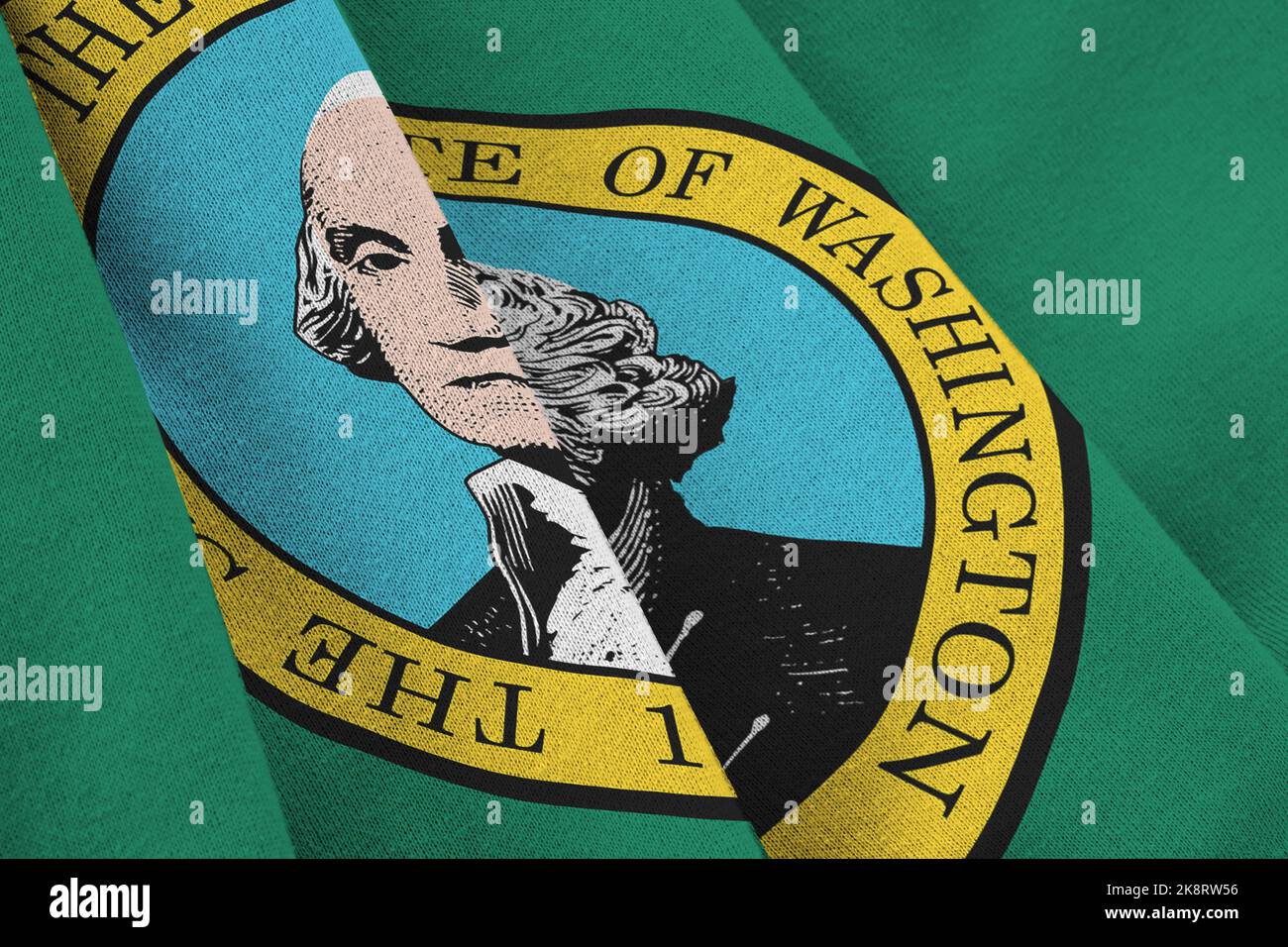 Washington US state flag with big folds waving close up under the ...