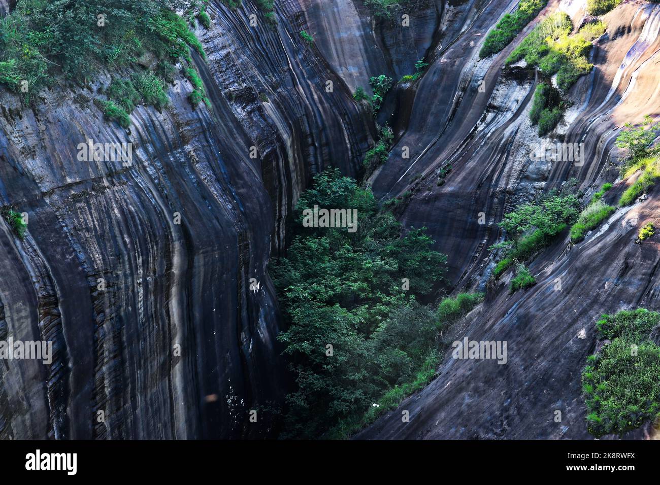 An aerial view of scenic rocky Gaoyi Ridge with scattered green ...