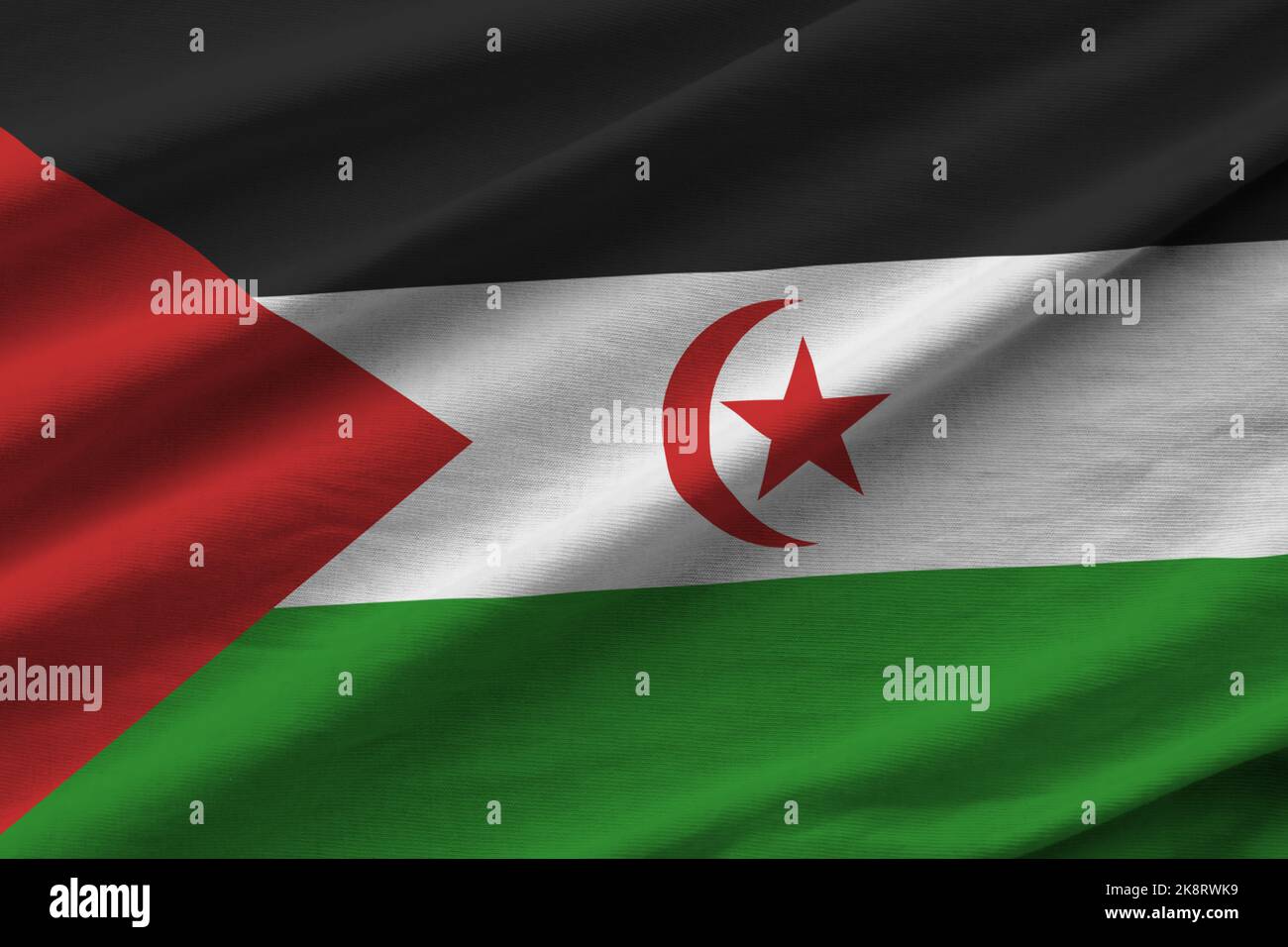 Western Sahara flag with big folds waving close up under the studio ...