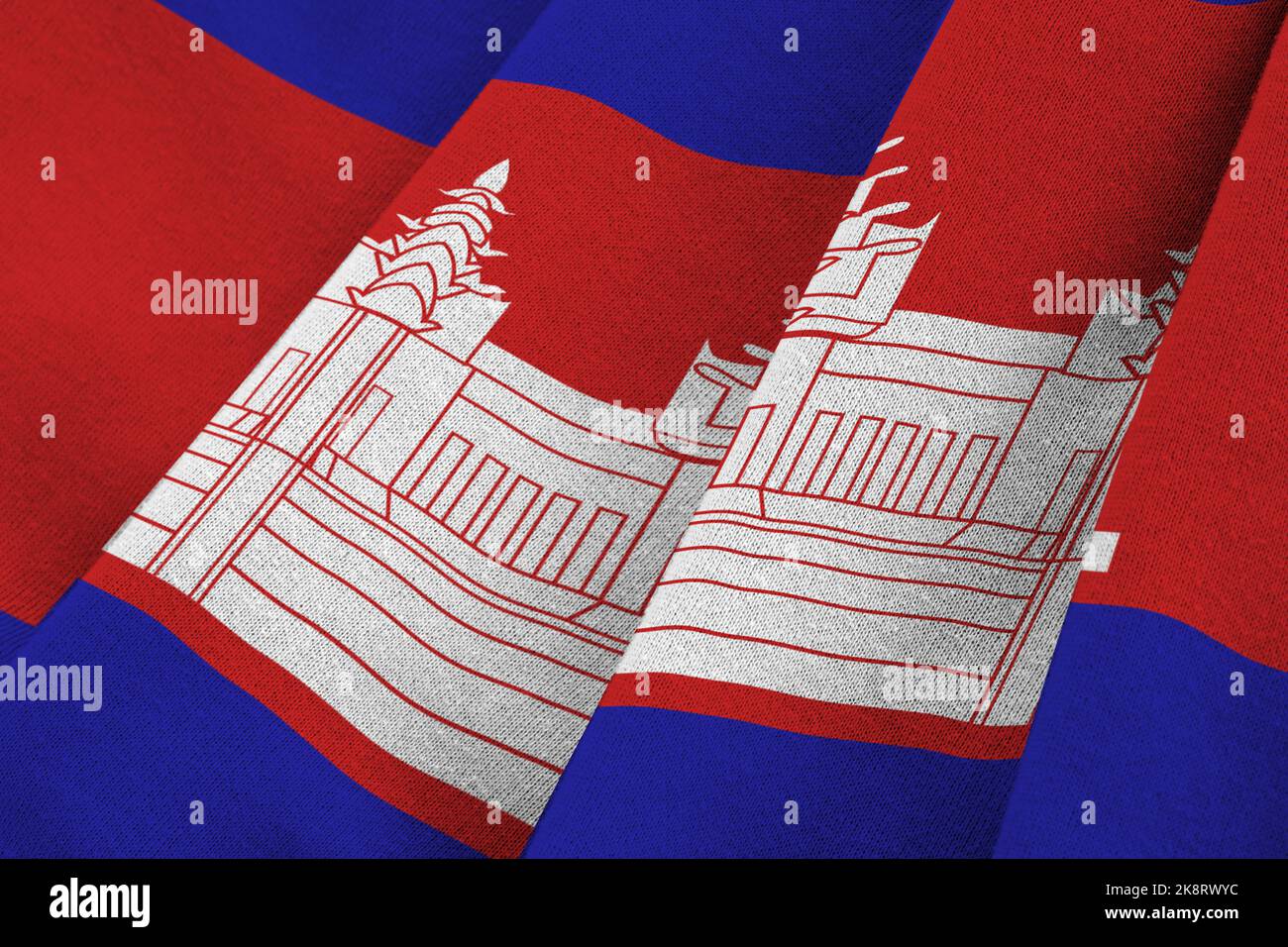 Cambodia flag with big folds waving close up under the studio light ...