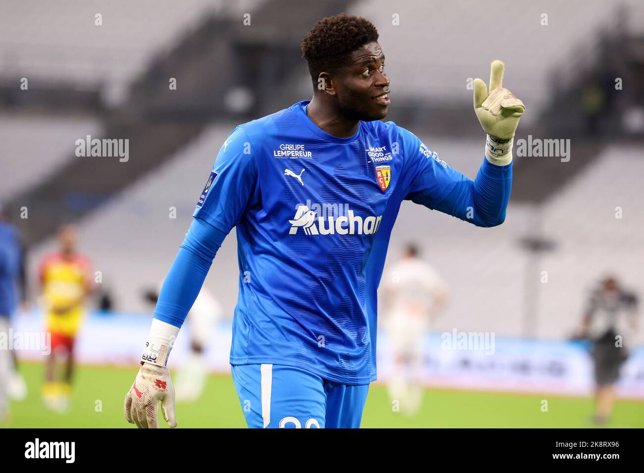 Goalkeeper of Lens Brice Samba celebrates the victory following the ...