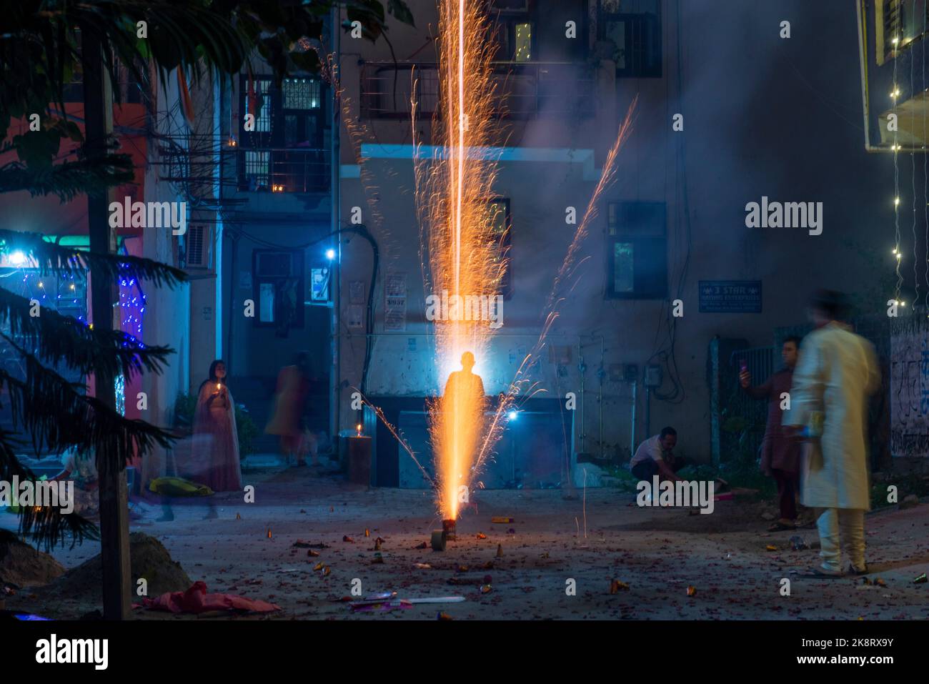 Ghaziabad, India. 24th Oct, 2022. People seen burning firecrackers ...