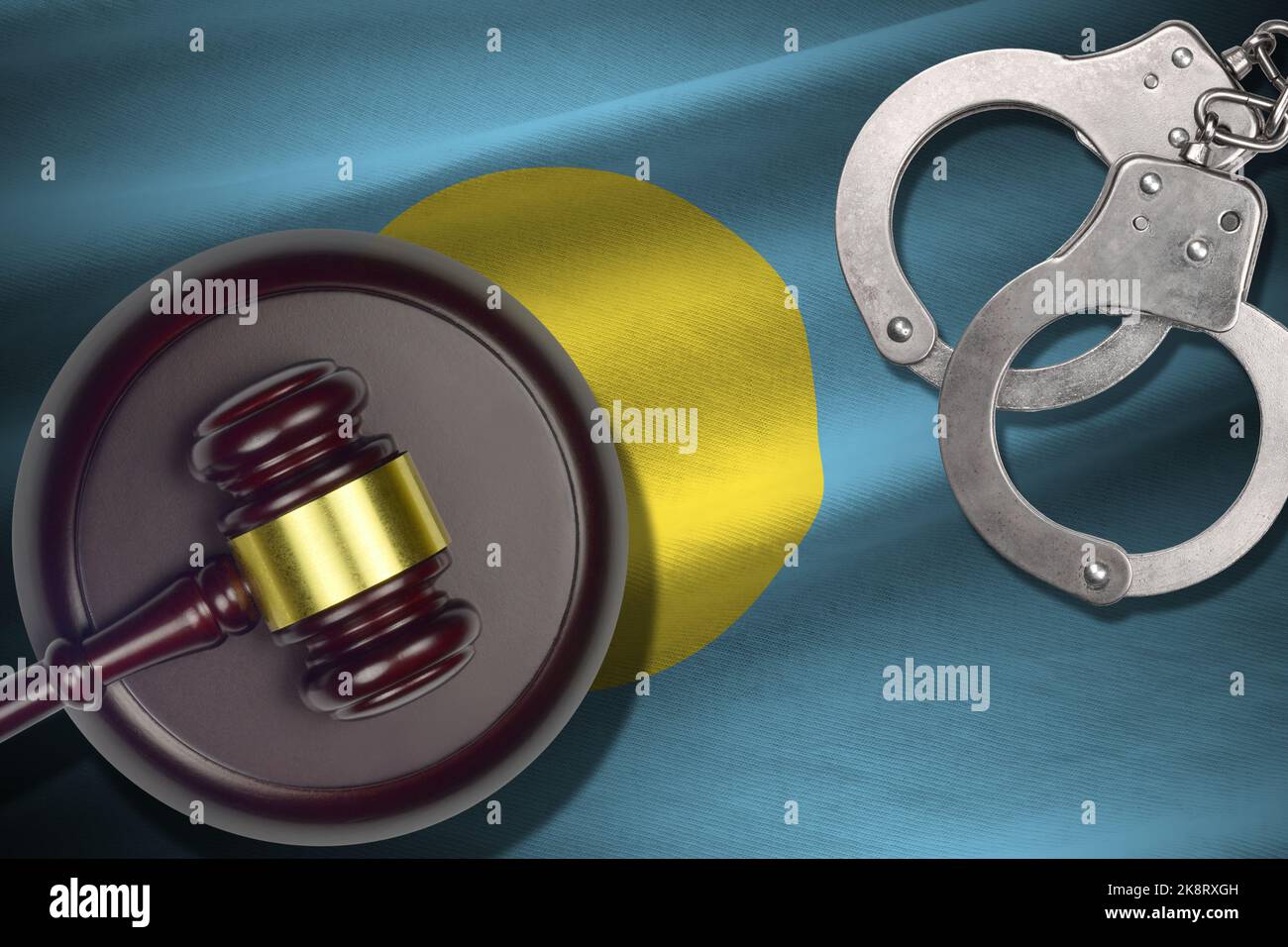 Palau flag with judge mallet and handcuffs in dark room. Concept of ...