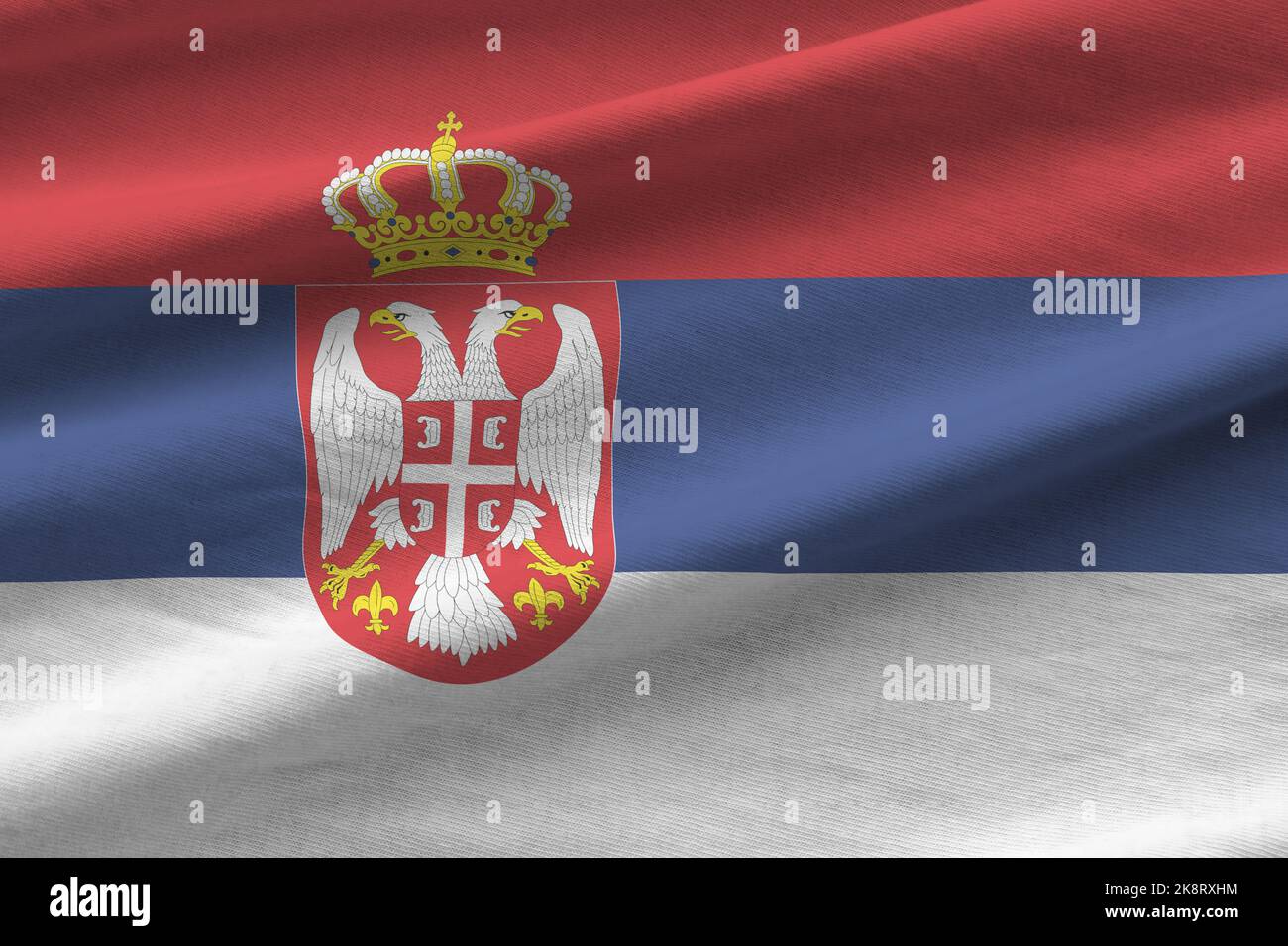 Serbia flag with big folds waving close up under the studio light ...