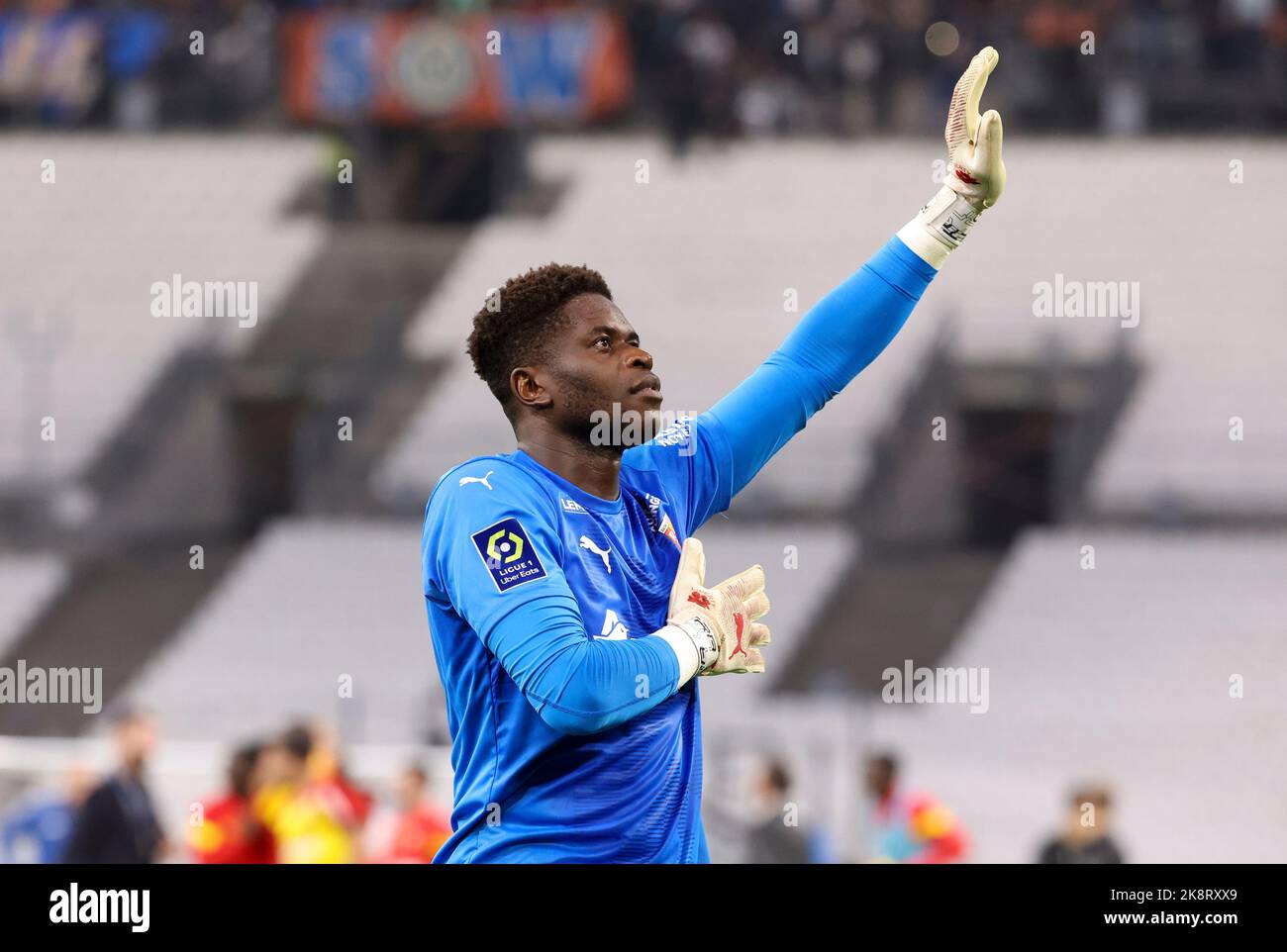 Goalkeeper of Lens Brice Samba celebrates the victory following the ...